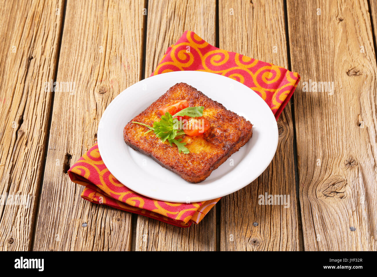 French toast - Bread soaked in beaten eggs and then fried Stock Photo ...