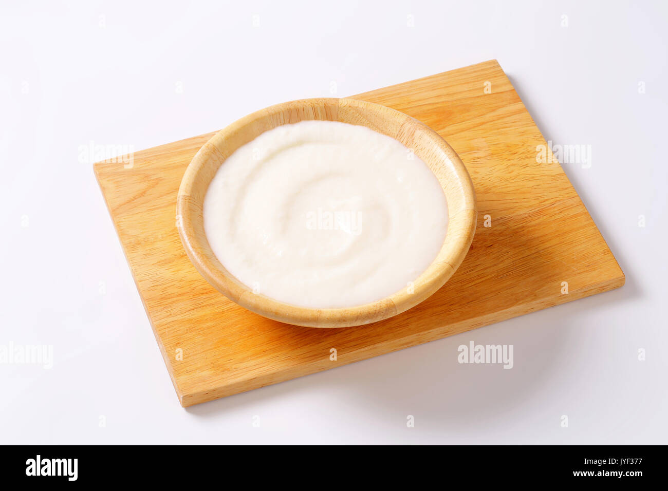 Semolina pudding in a bowl Stock Photo - Alamy