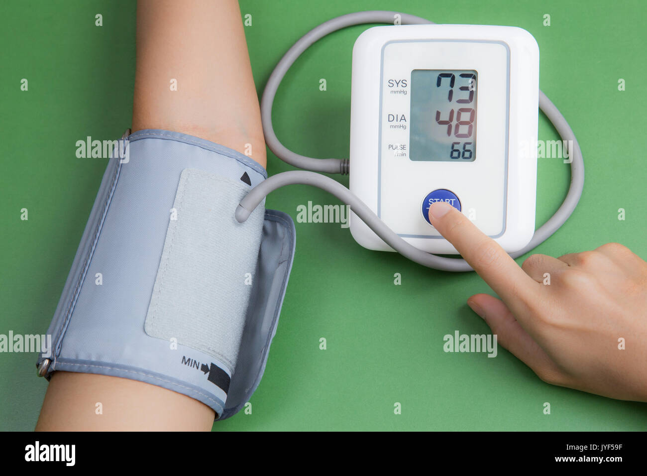measuring blood pressure with digital equipment Stock Photo - Alamy