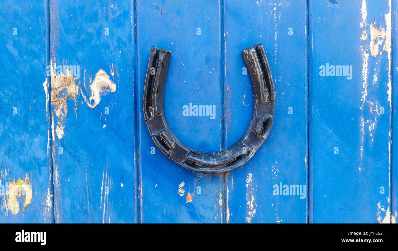 Horseshoe on a door hi-res stock photography and images - Alamy