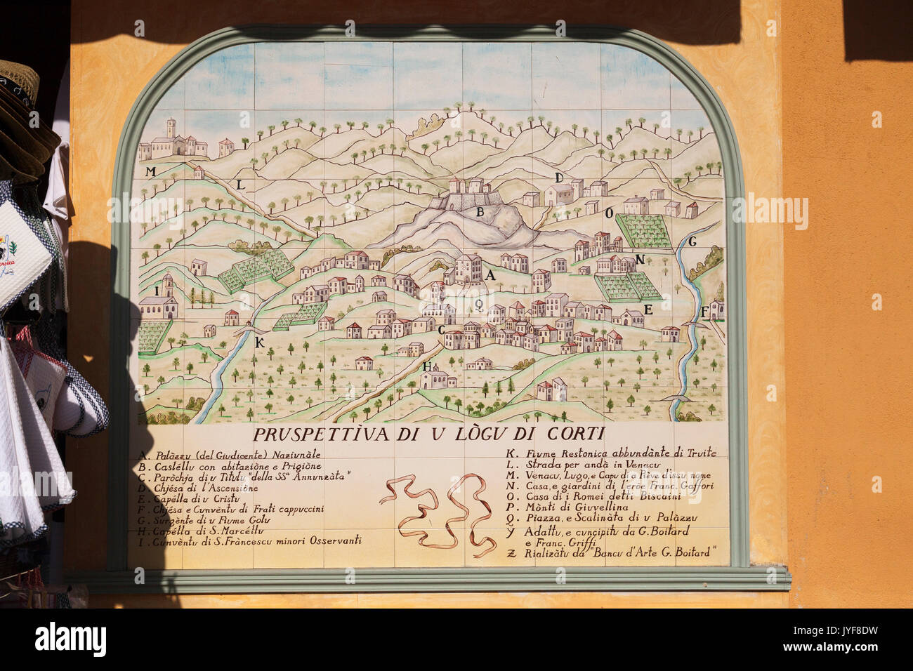 Details of a city map on a concrete wall in the old town Corte Haute ...