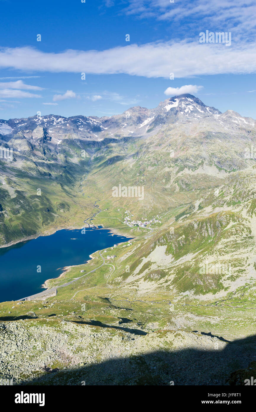 Top view of the blue Lake Montespluga and the rocky Peak Tambò in ...