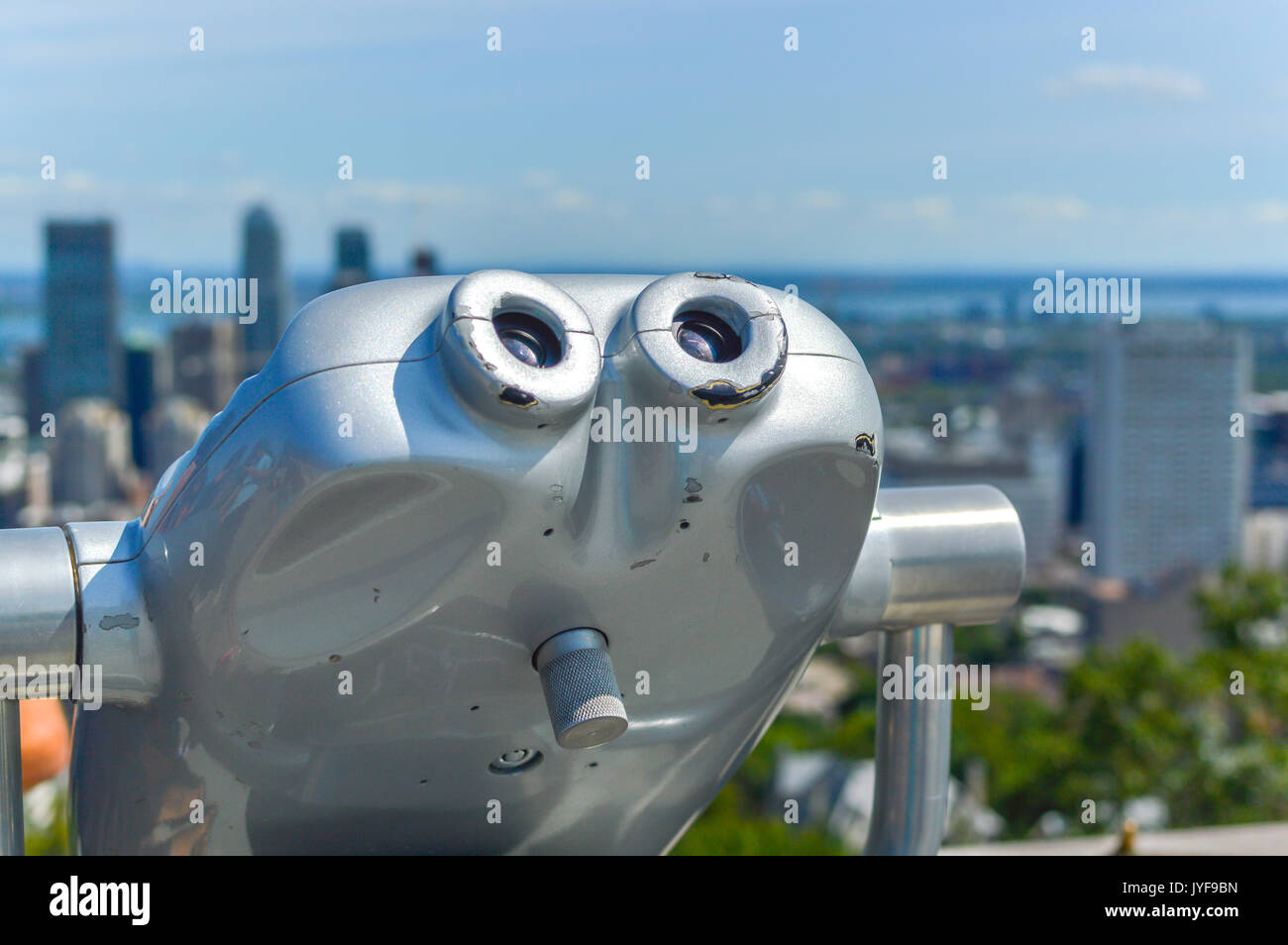 Hi-Spy viewing machines overlooking Montreal skyline Stock Photo - Alamy