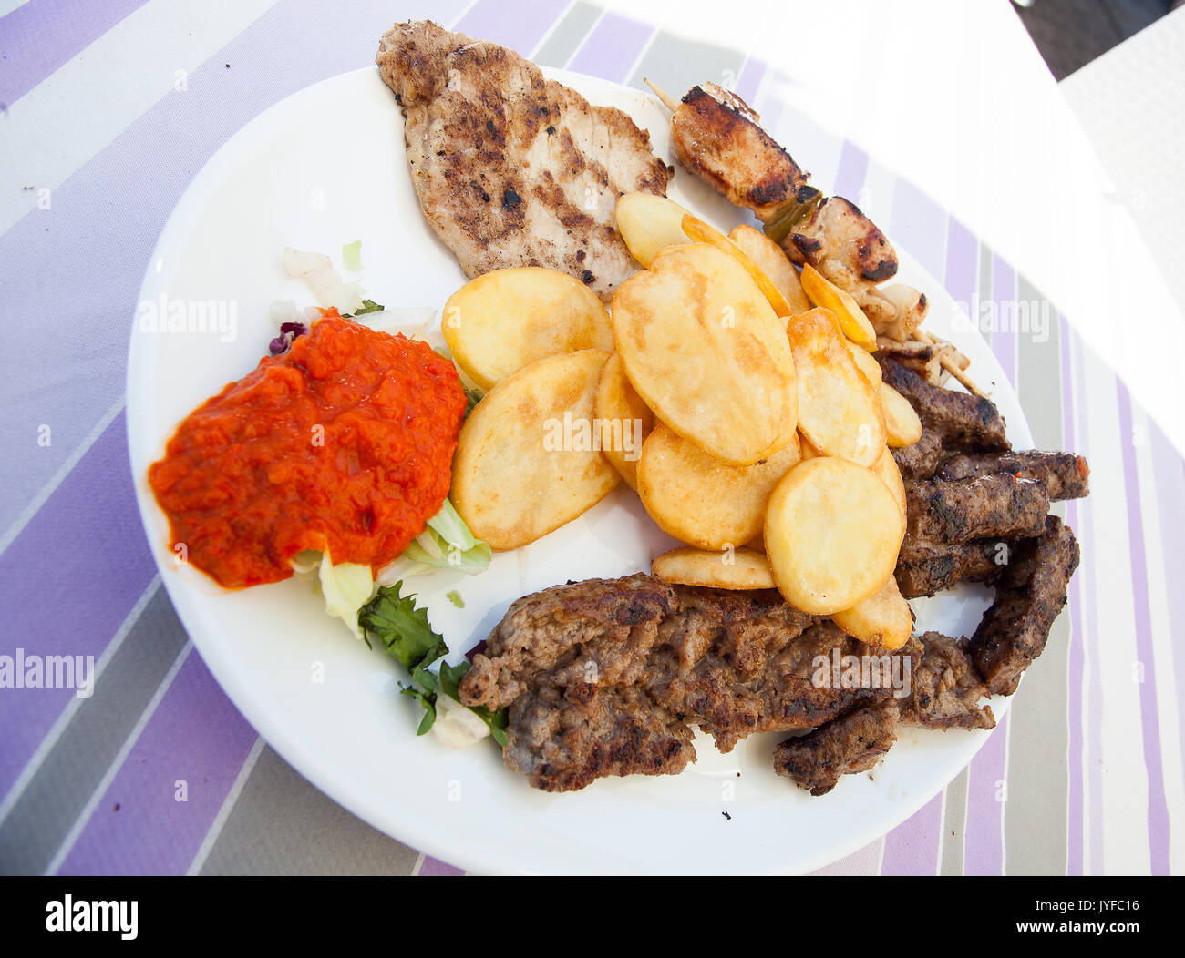 Typical summer grill in an Italian restaurant, light ambient Stock ...