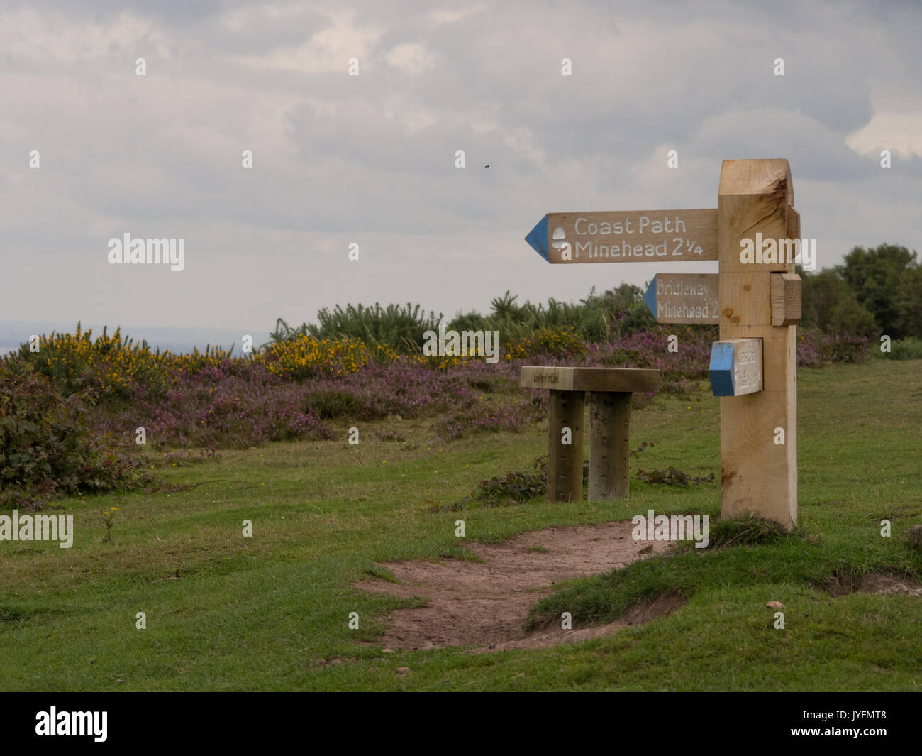 A wooden signpost on the South West Coast path in Exmoor National Park ...
