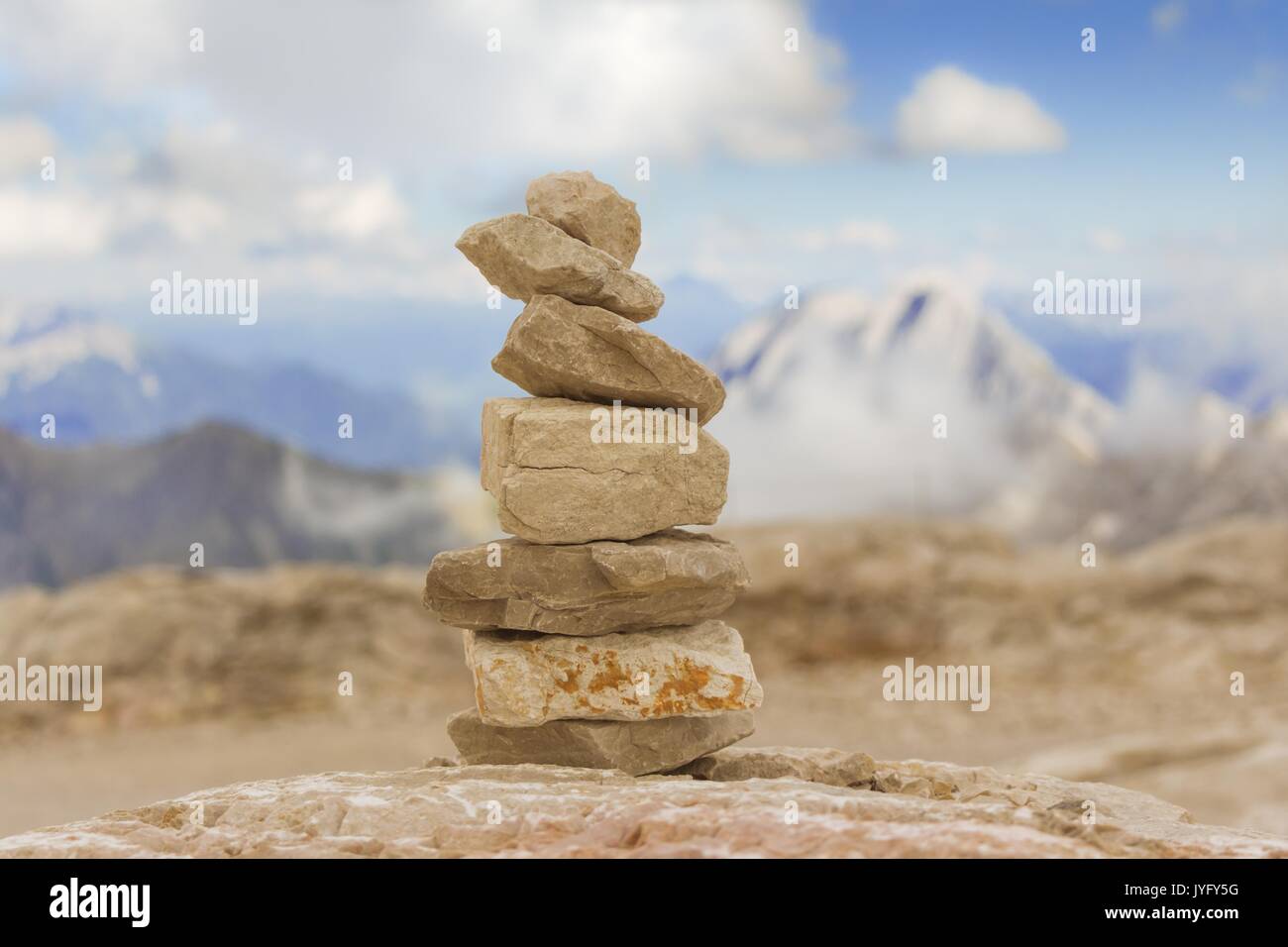 Stable stone tower in mountains show balance stability power. Stones ...