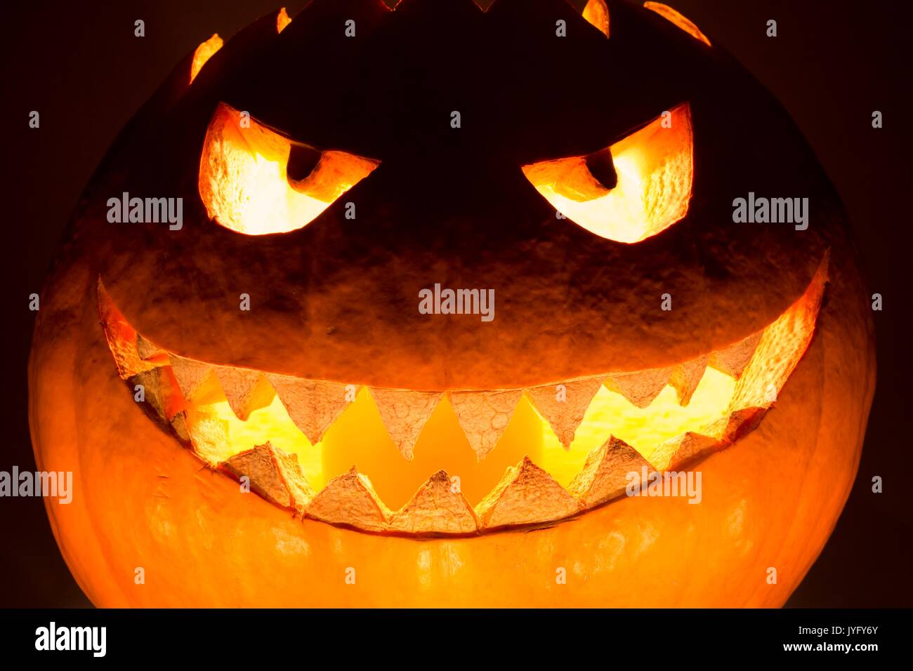 Fat big halloween pumpkin smile with hot burning fire eyes mouth ...