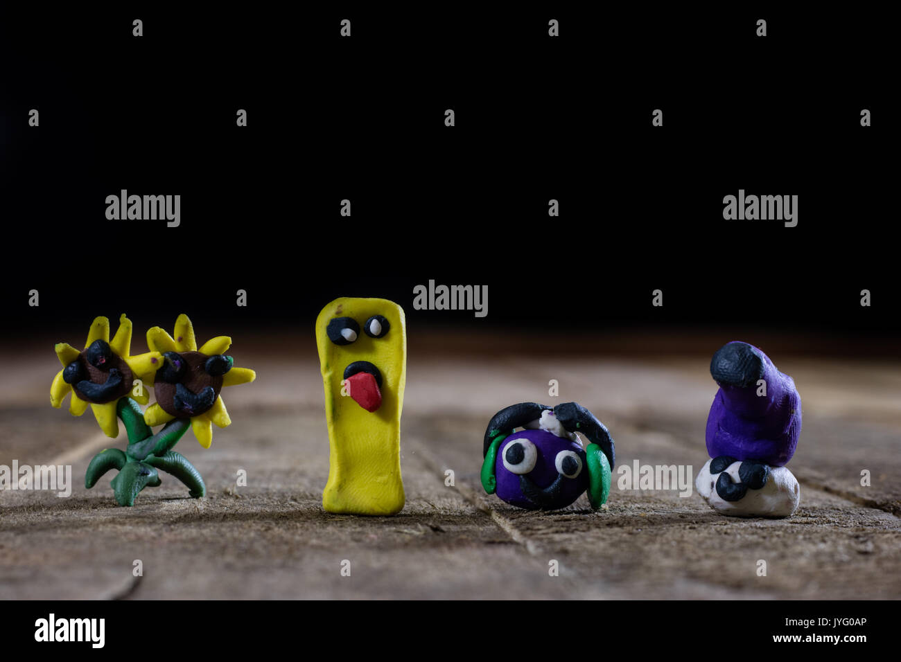 Plasticine man with fairy tales for children. black background Stock ...