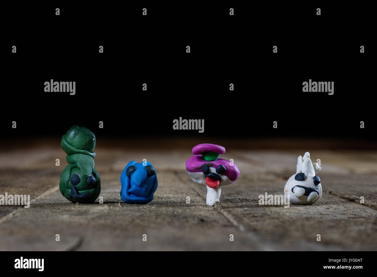 Plasticine man with fairy tales for children. black background Stock ...
