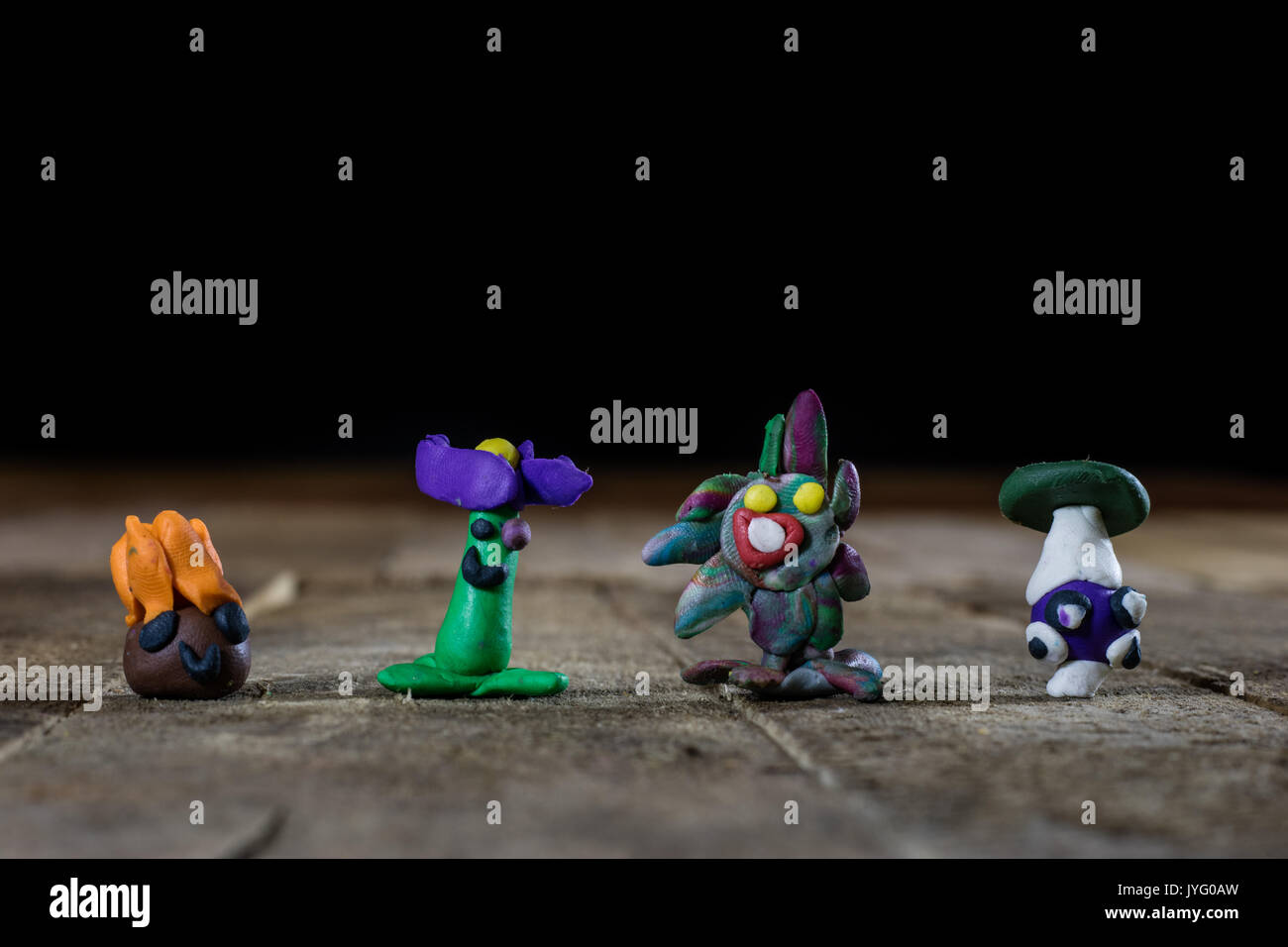 Plasticine man with fairy tales for children. black background Stock ...