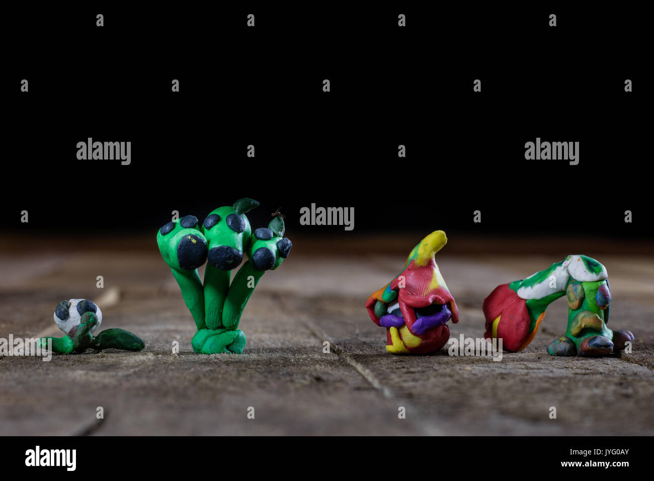 Plasticine man with fairy tales for children. black background Stock ...