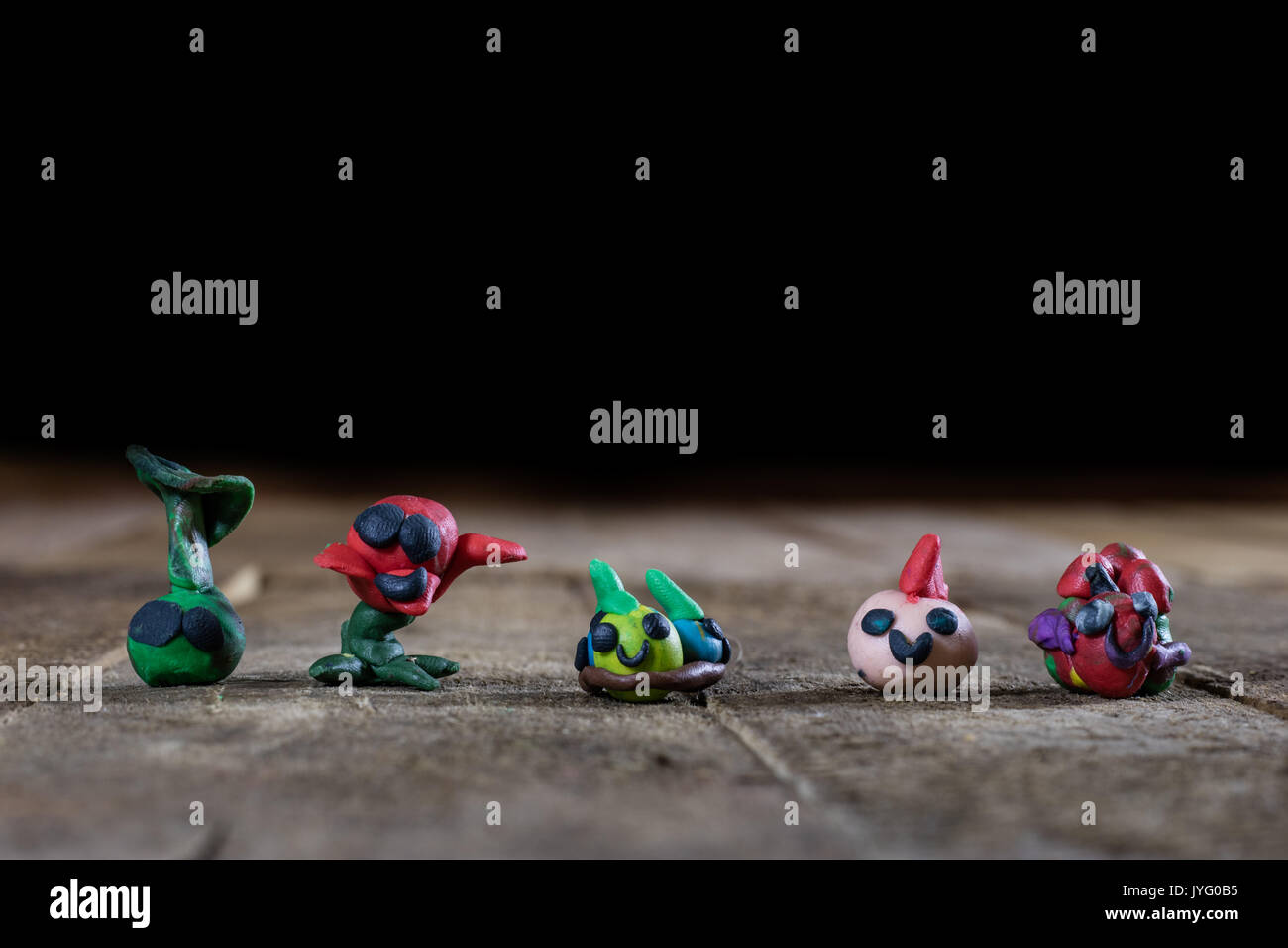 Plasticine man with fairy tales for children. black background Stock ...