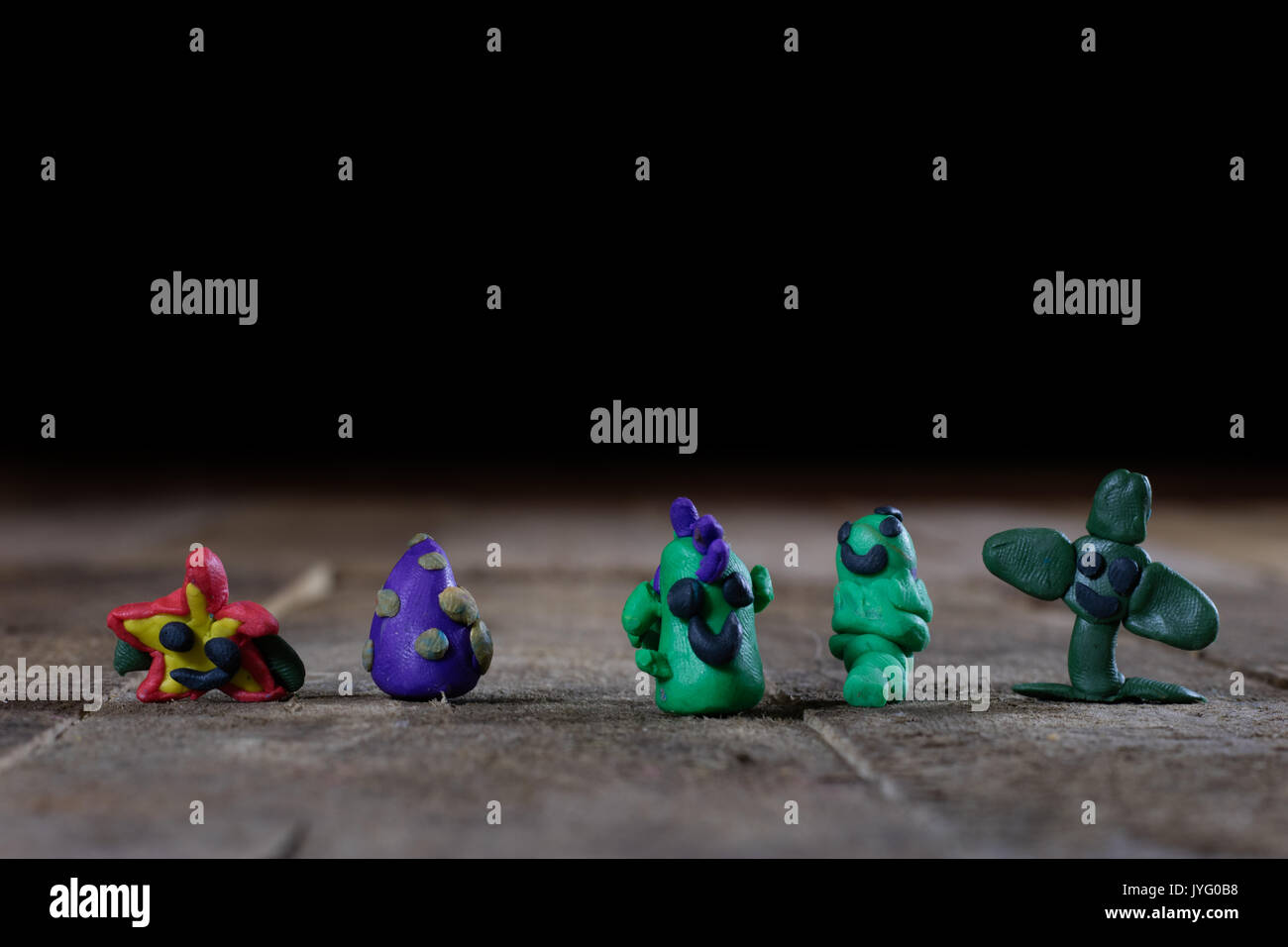 Plasticine man with fairy tales for children. black background Stock ...