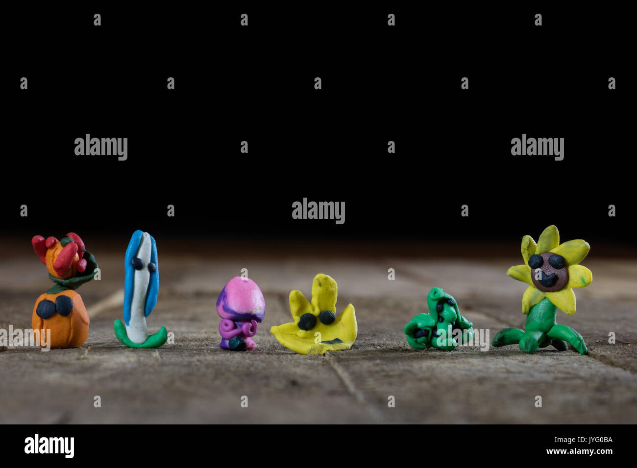 Plasticine man with fairy tales for children. black background Stock ...