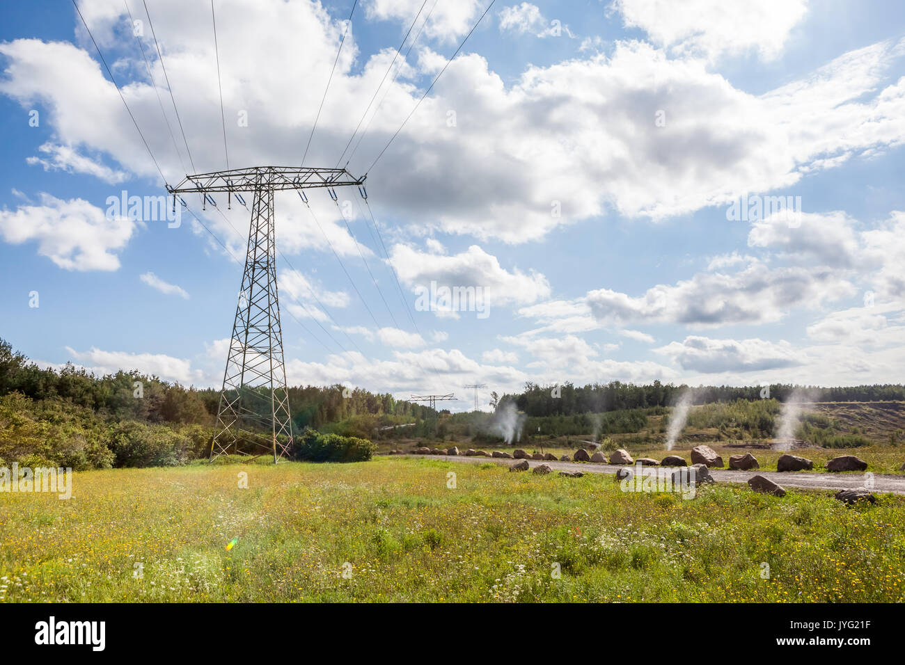 Electricity pole on an sunny day whit clouds Stock Photo - Alamy