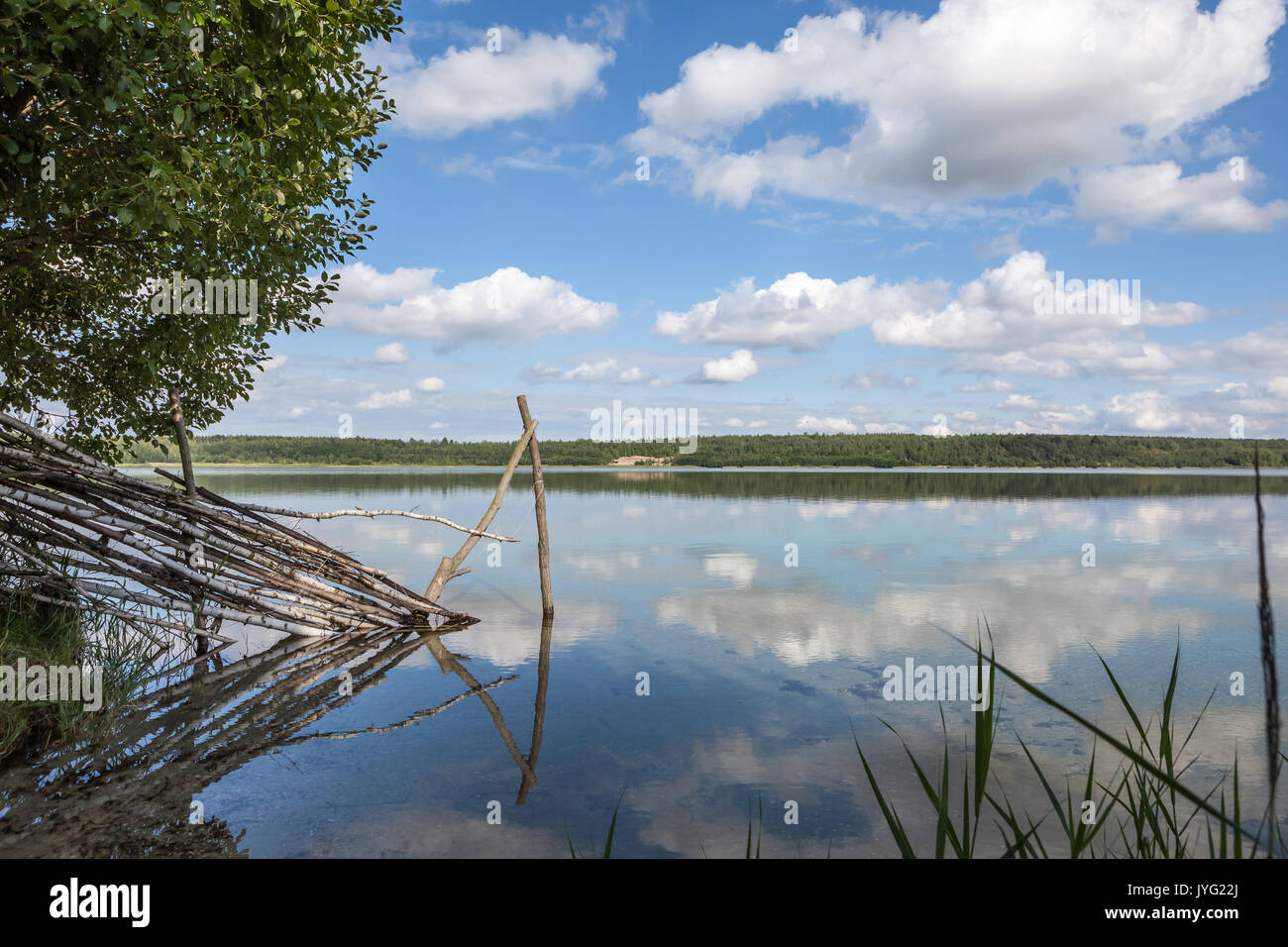An large pool landscape with clouds reflecting on the water Stock Photo ...