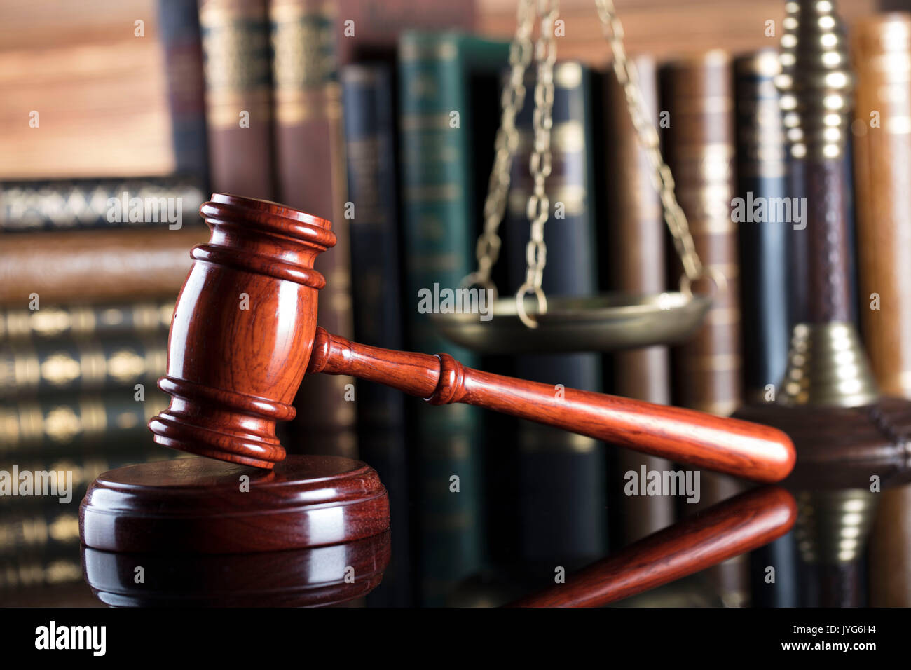 Gavel of the jugde and scale of justice in the court library Stock ...