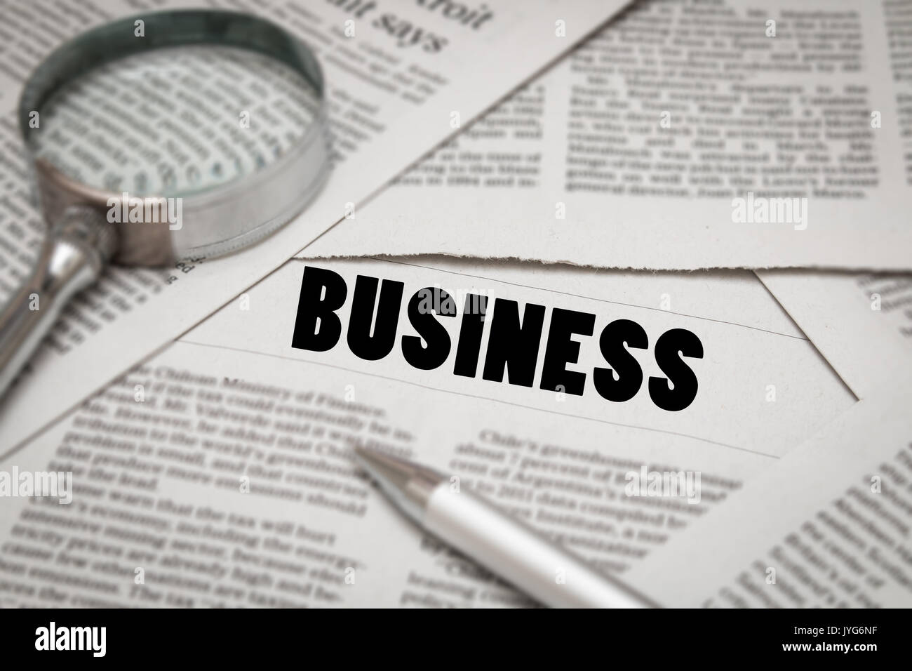 business analysis concept with newspaper background Stock Photo - Alamy