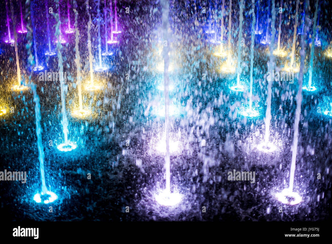vibrant fountain with water splash Stock Photo - Alamy