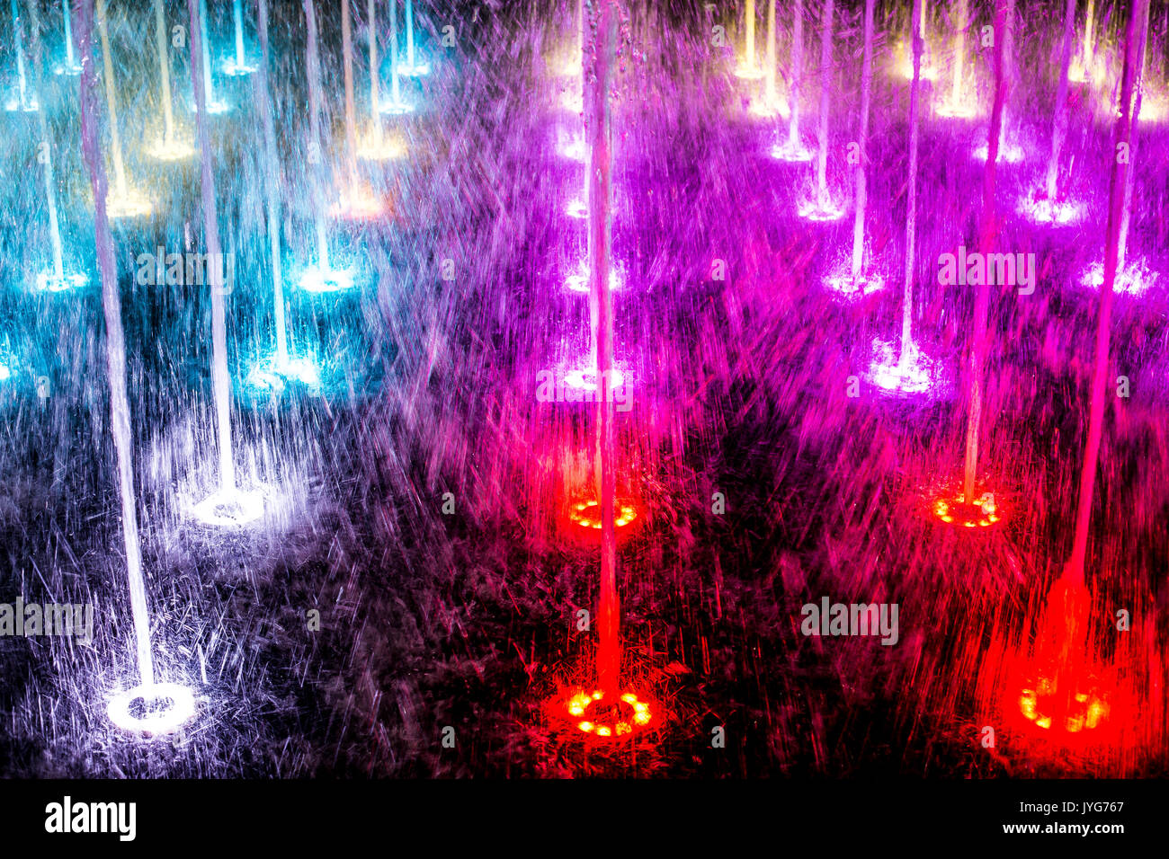 vibrant fountain with water splash Stock Photo - Alamy