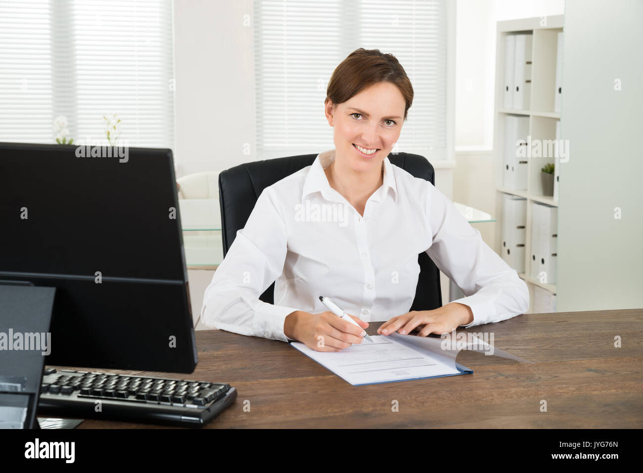 Report writing computer hi-res stock photography and images - Alamy