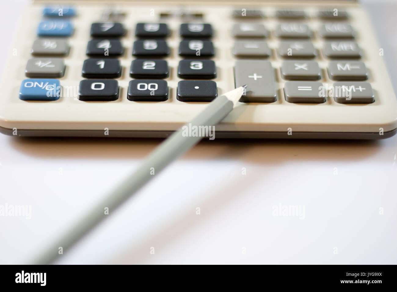 Documents, calculations, calculator, calculator and pen and a pencil on ...