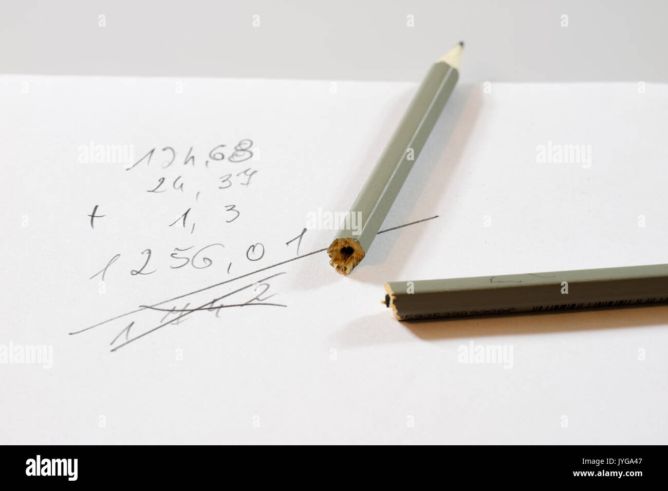 Documents, calculations, calculator, calculator and pen and a pencil on ...