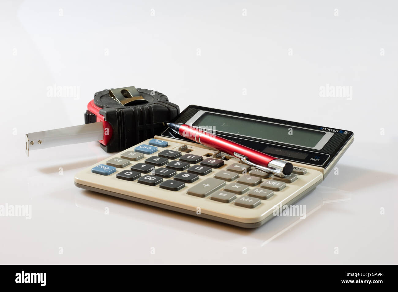Documents, calculations, calculator, calculator and pen and a pencil on ...