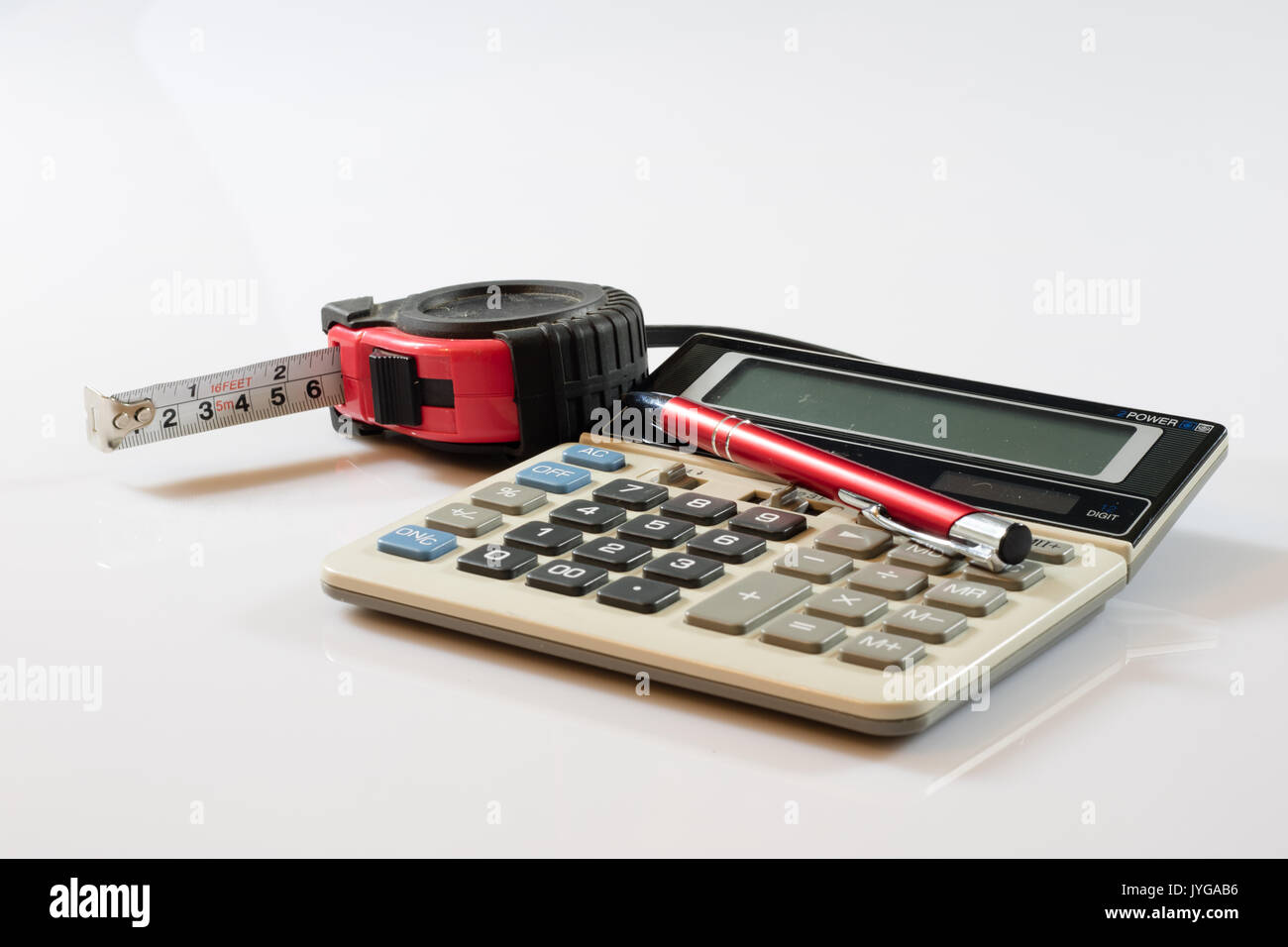 Documents, calculations, calculator, calculator and pen and a pencil on ...