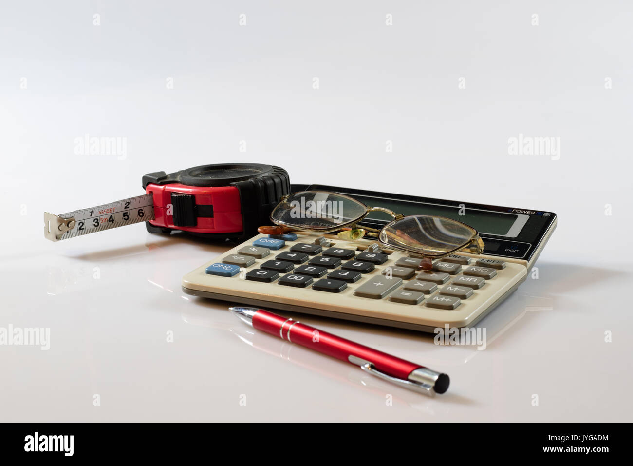 Documents, calculations, calculator, calculator and pen and a pencil on ...