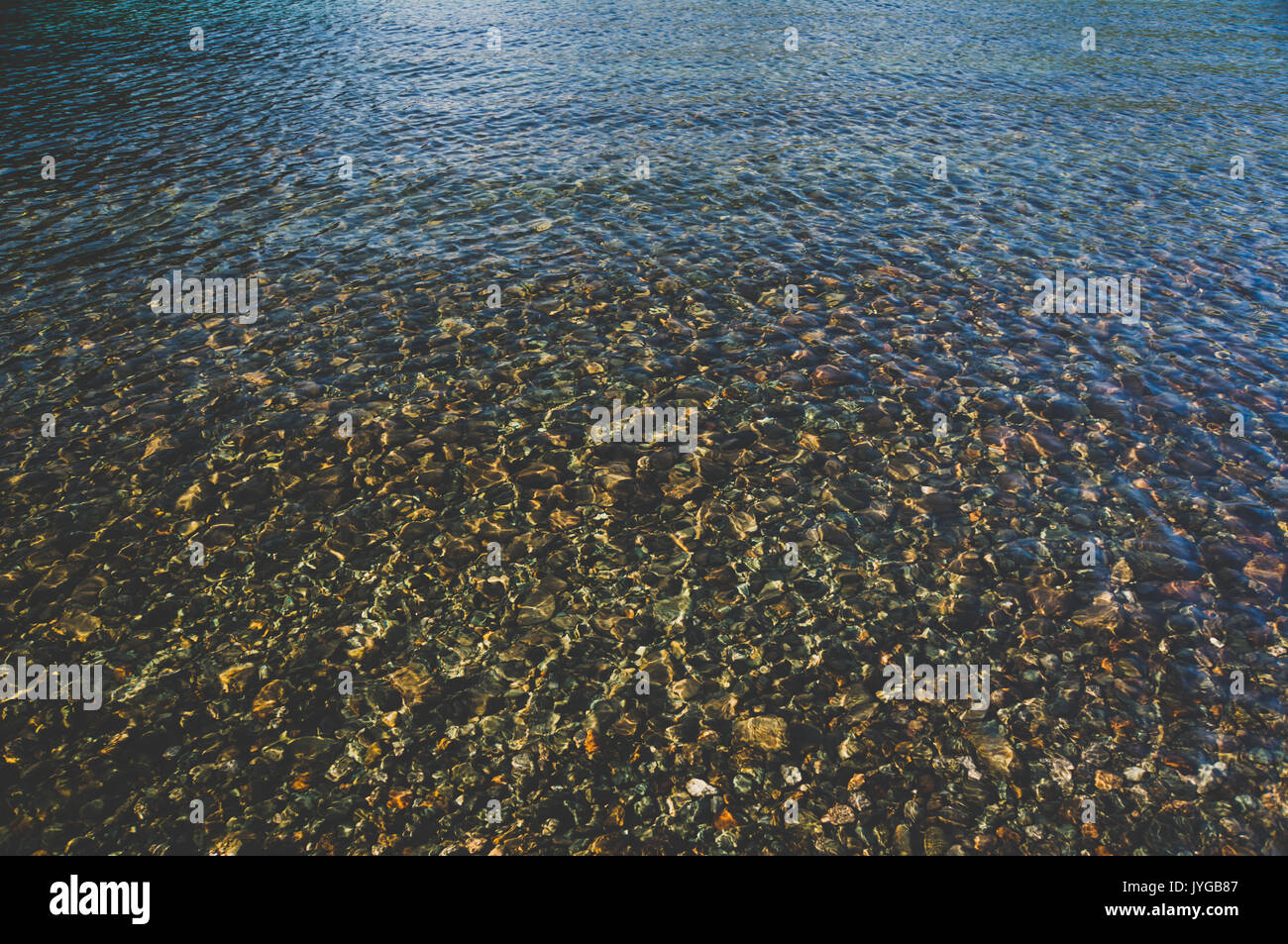 Stones under water on background hi-res stock photography and images ...