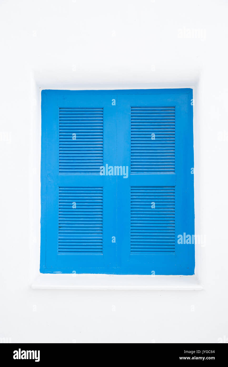 blue closed windows on white wall Stock Photo - Alamy