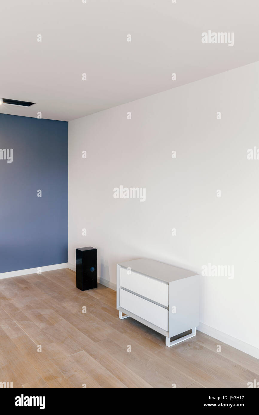 empty indoor space with blue wall Stock Photo - Alamy