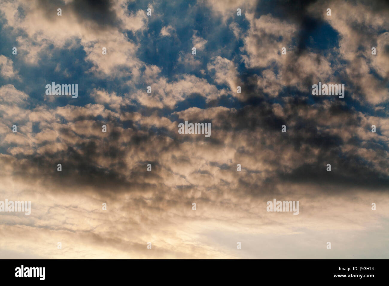 dramatic blue sky with dark clouds Stock Photo - Alamy