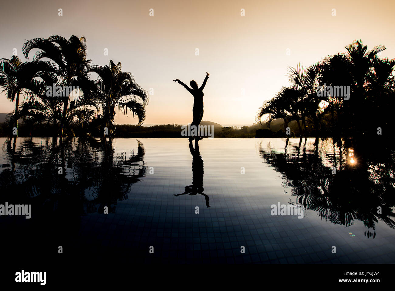 silhouette success woman hands up Stock Photo - Alamy