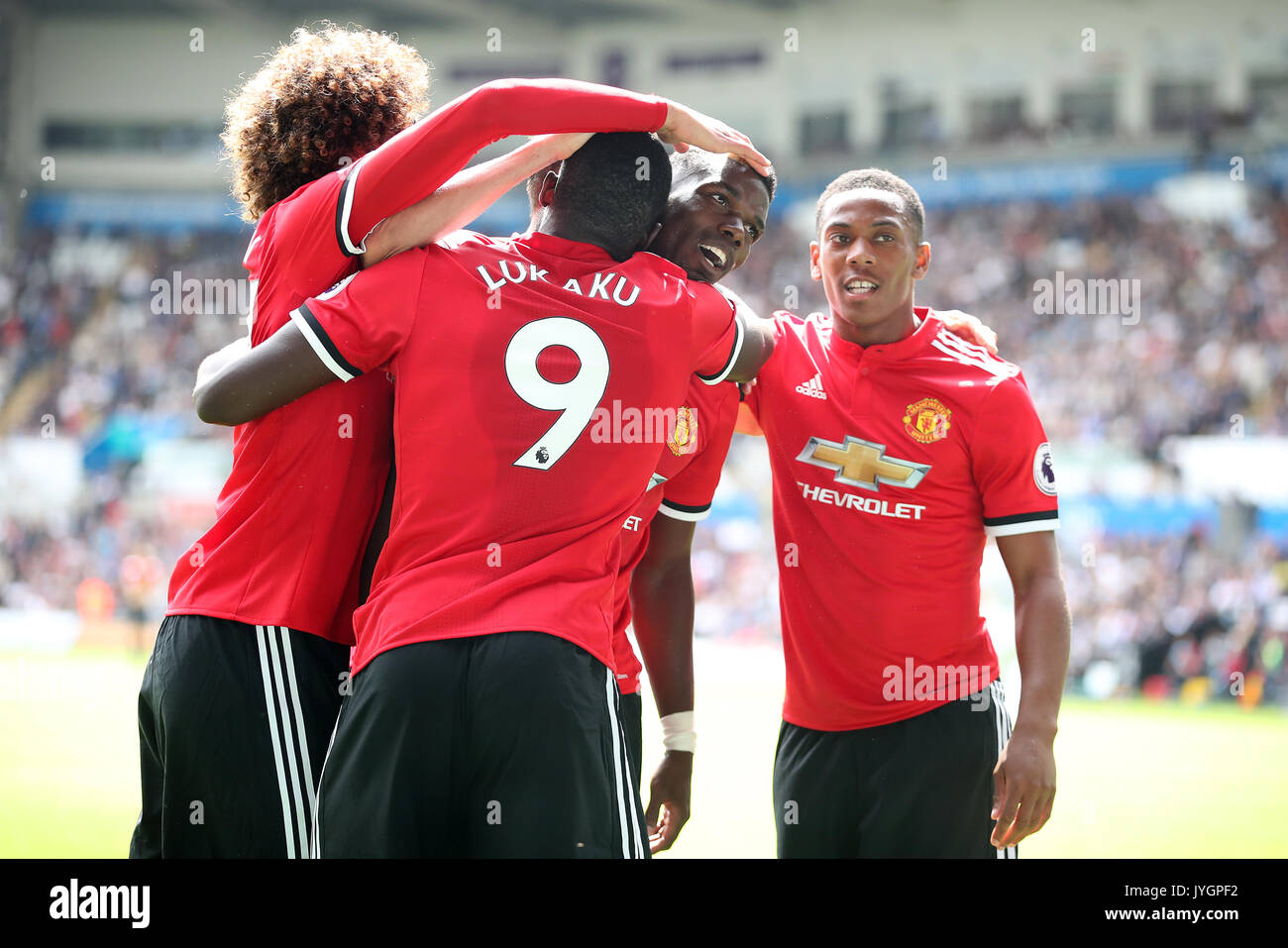 Manchester United's Paul Pogba (centre) celebrates scoring his side's ...