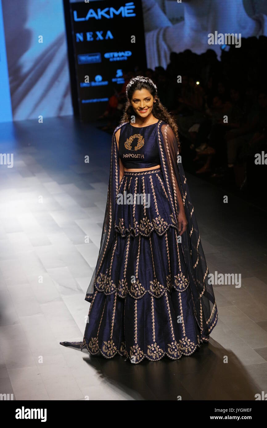 Mumbai, India. 19th August, 2017. Models walk the ramp for designer ...