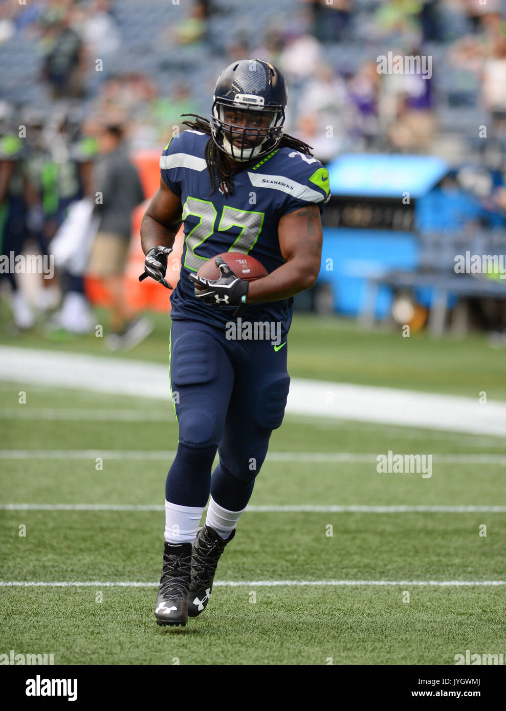 August 18, 2017: Seattle running back Eddie Lacey (27) warming up ...