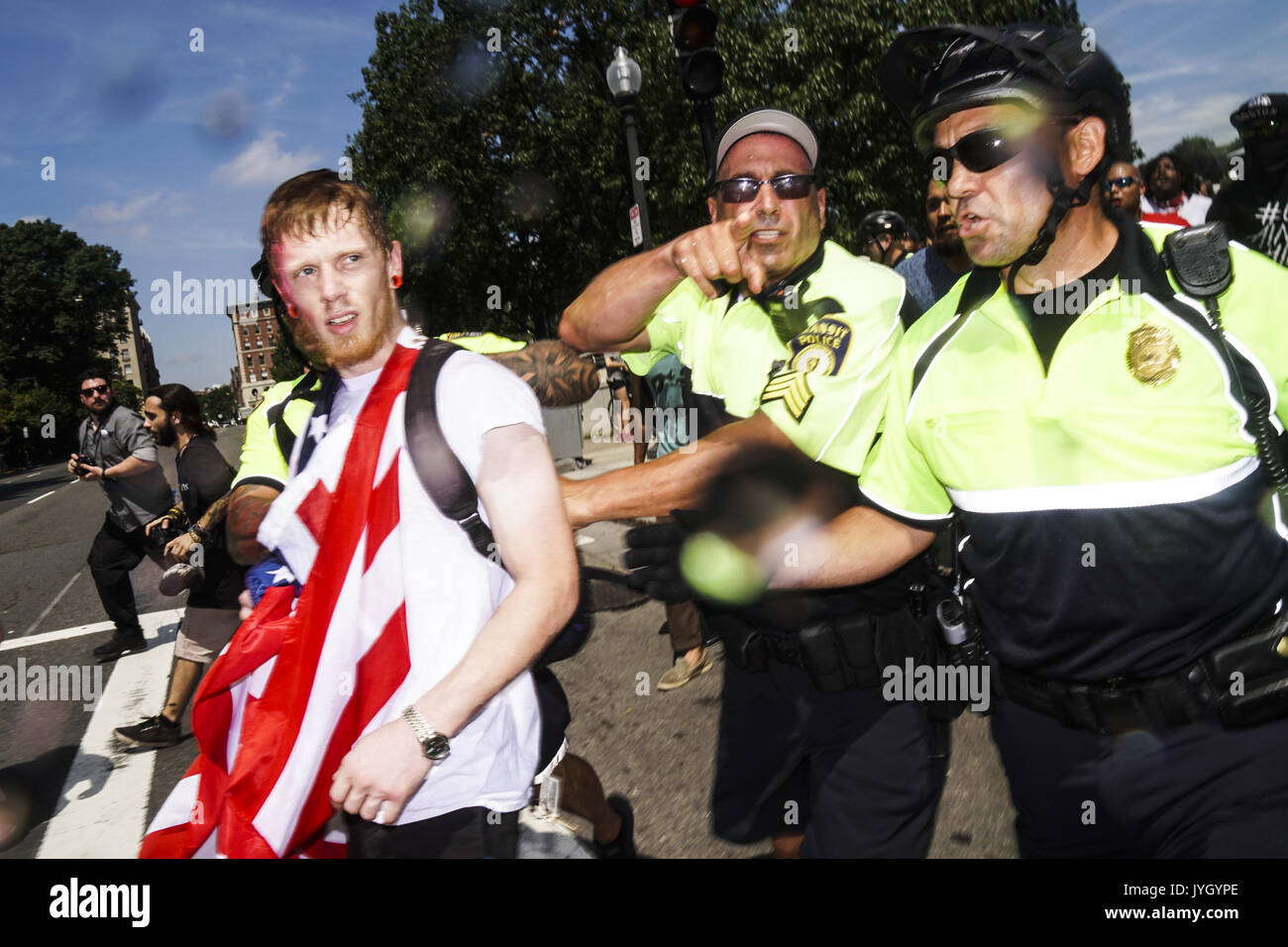 Boston, Massachusetts, USA. 19th Aug, 2017. A man on the left with ...