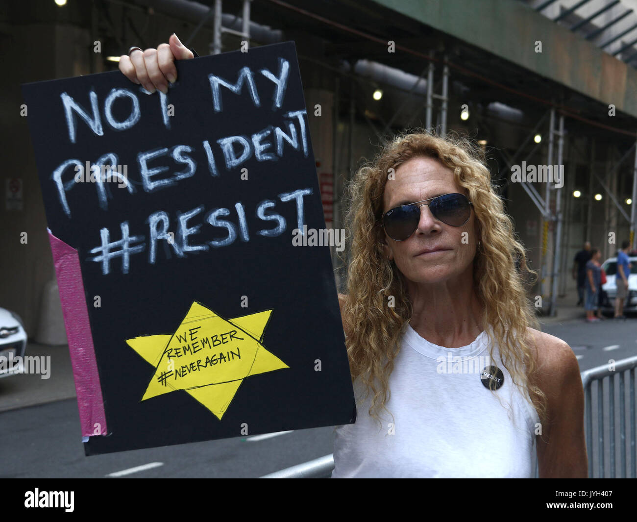 New York, New York, USA. 19th Aug, 2017. Demonstrator at the Counter ...