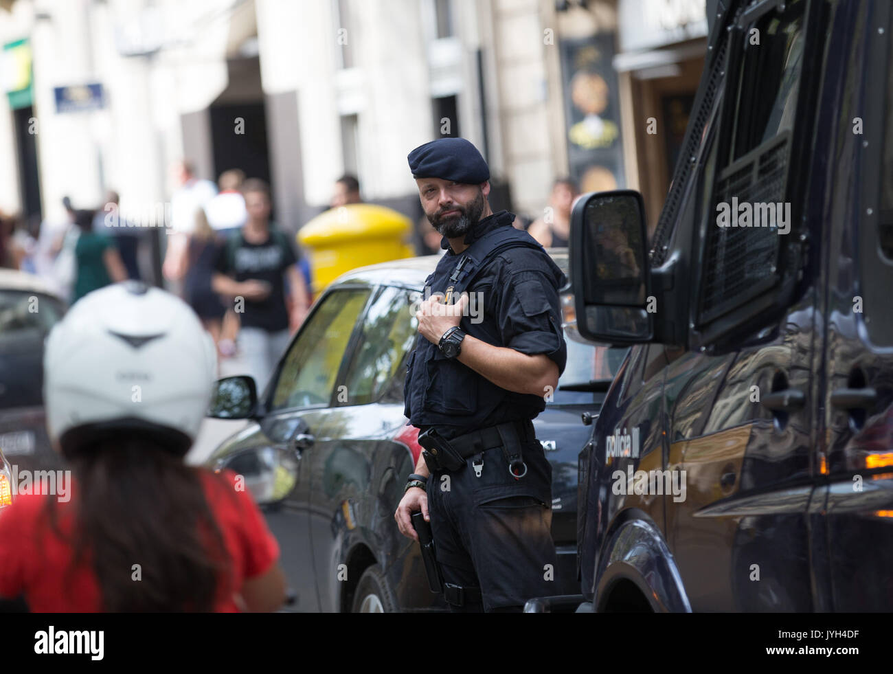 Barcelona, Spain. 19th Aug, 2017. A Spanish policeman patrols in the ...