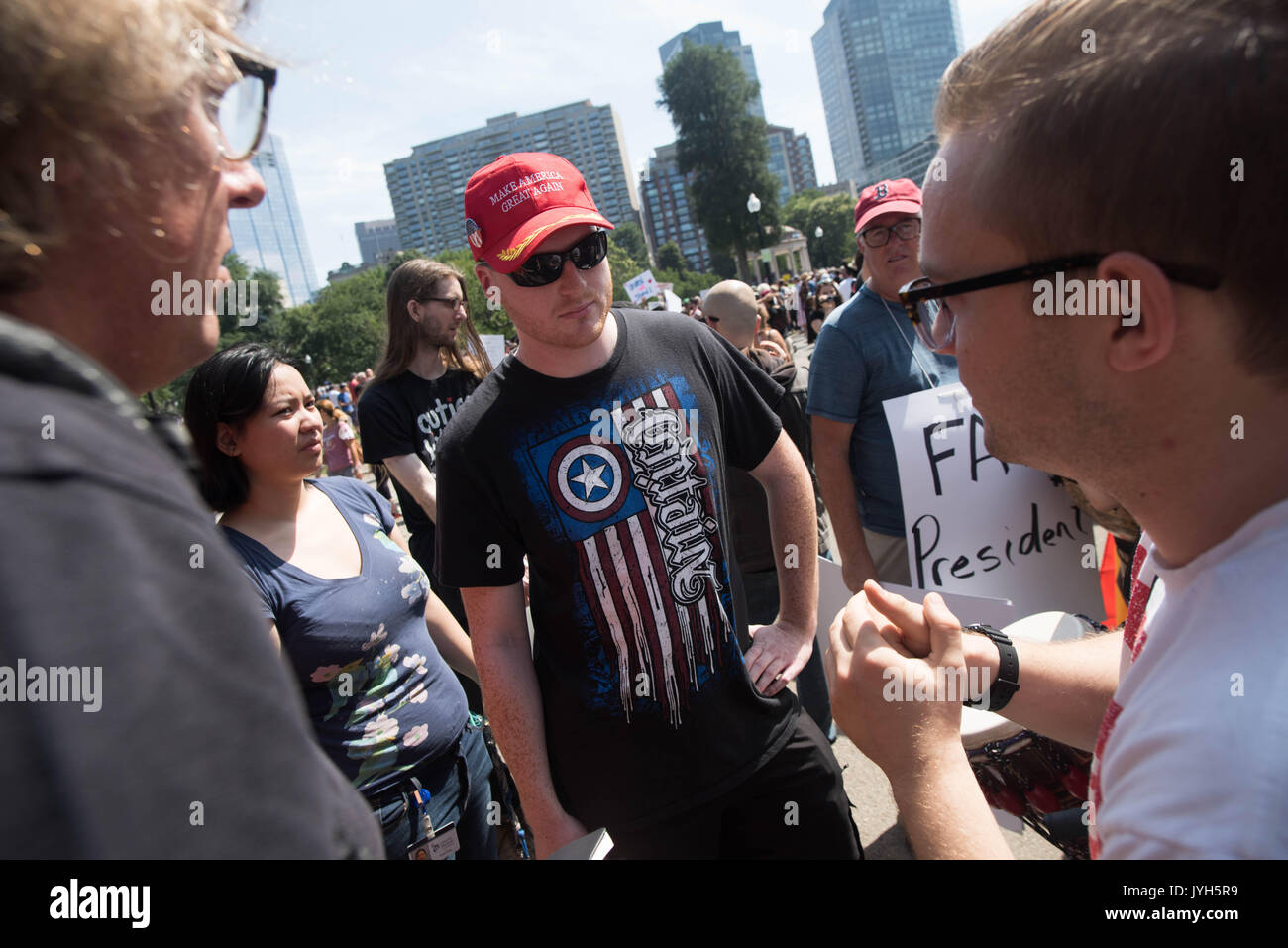 Boston, Massachusetts, USA. 19th Aug, 2017. Counter protesters swarm a ...