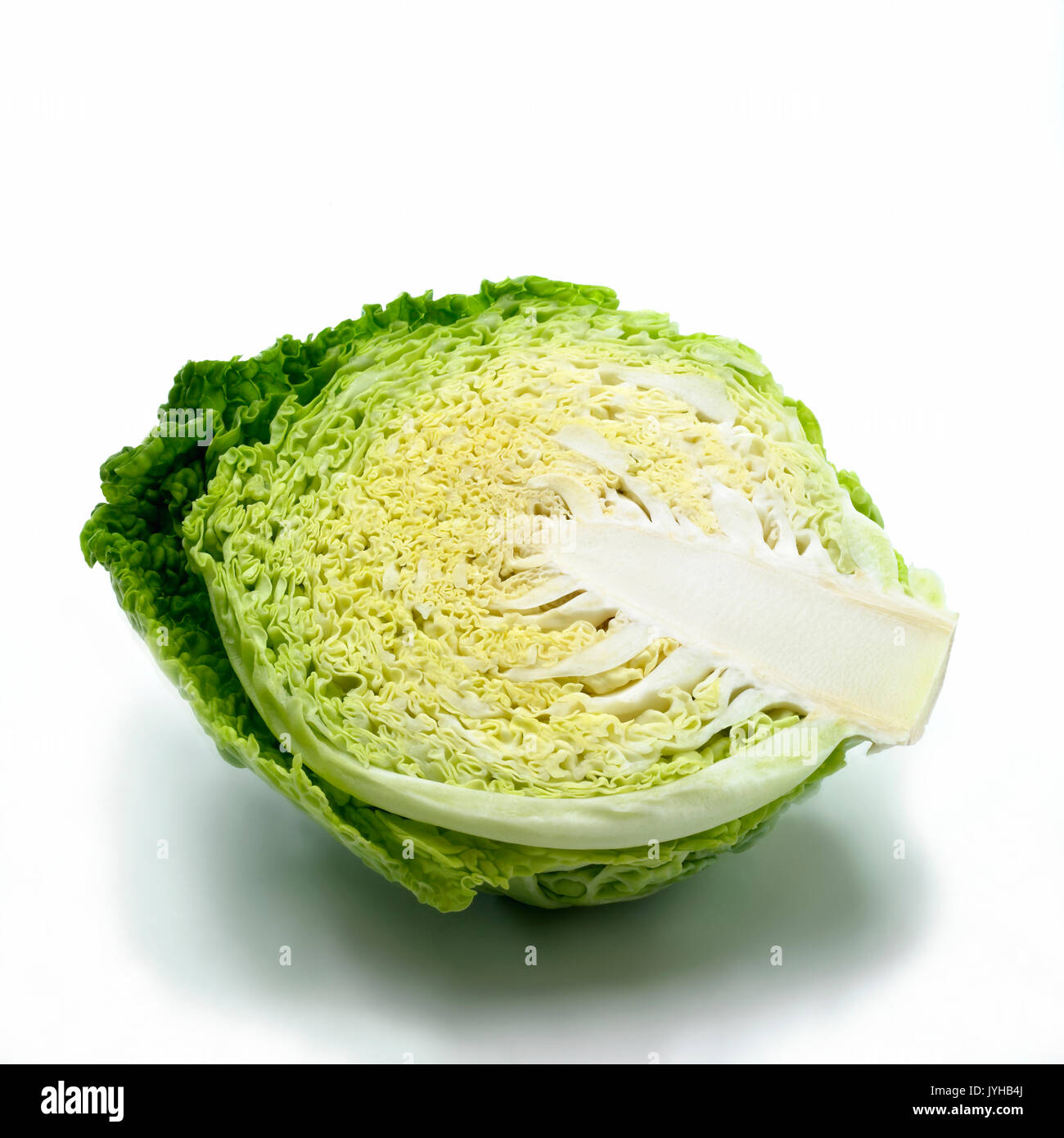 Sliced Half Savoy Cabbage on White Background Stock Photo - Alamy