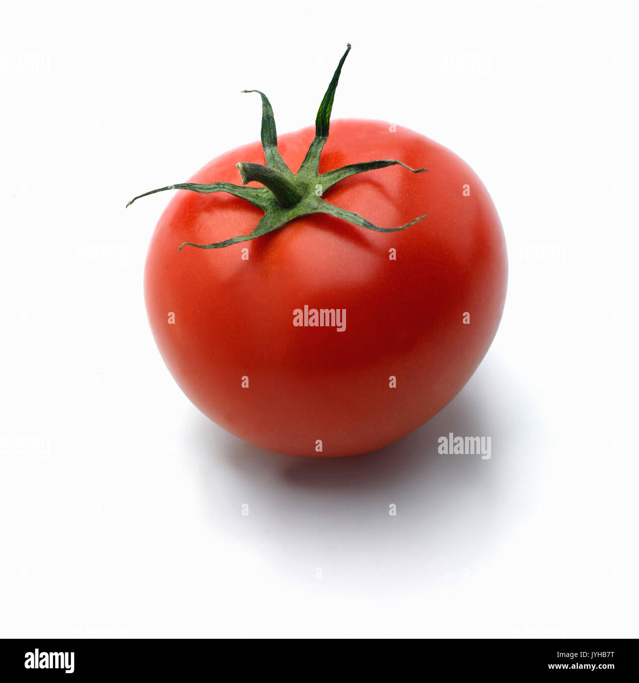 Single Red Tomato on White Background Stock Photo - Alamy