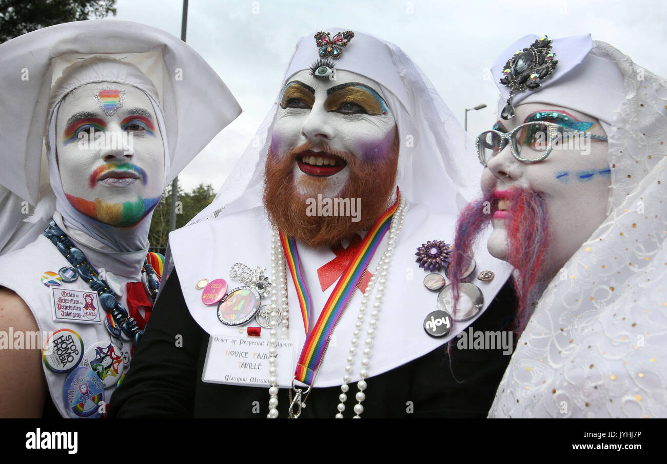 People in fancy dress take part in the Pride Glasgow parade through the ...