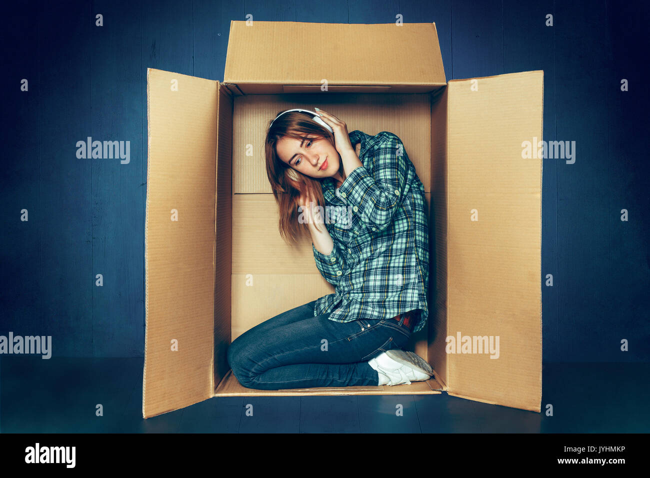 Businessman sitting inside the box hi-res stock photography and images ...