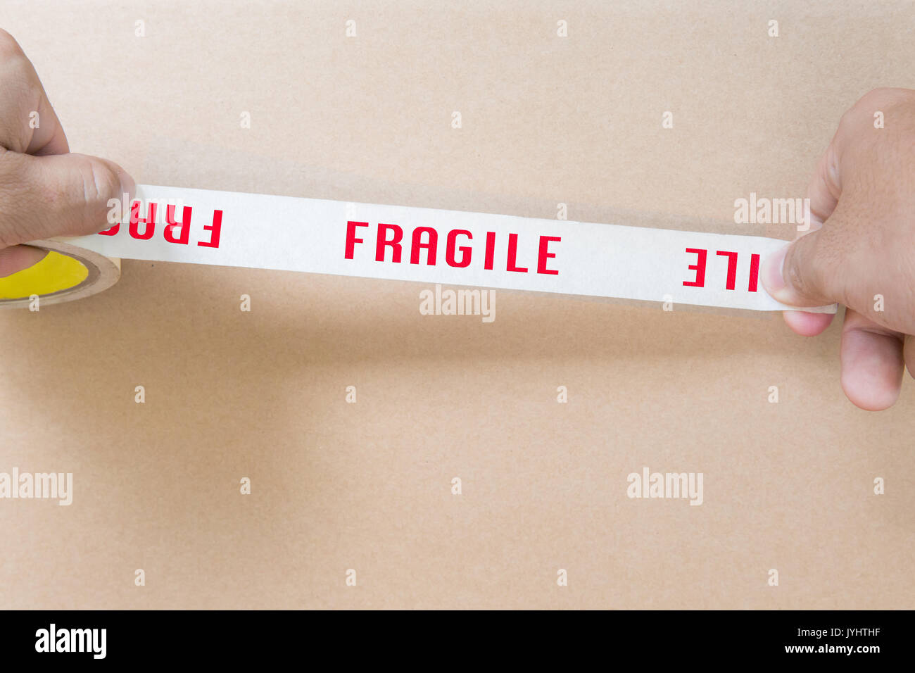 Fragile tape hi-res stock photography and images - Alamy