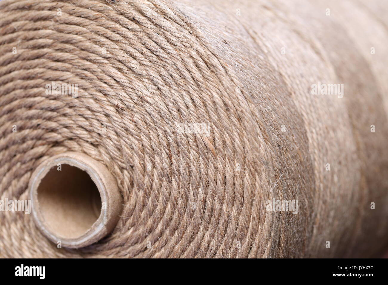 rolled up brown rope background with core Stock Photo - Alamy