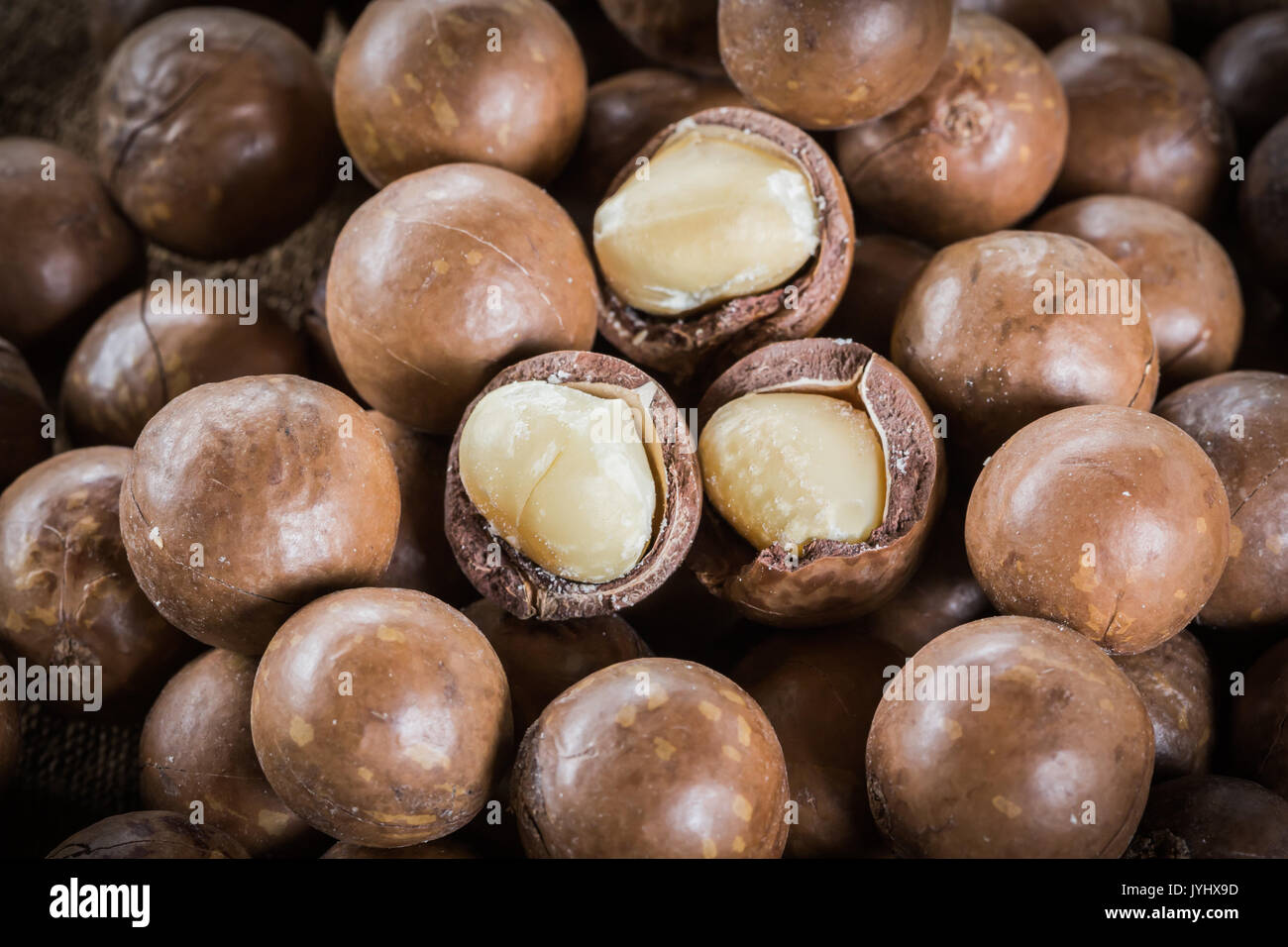 heap of macadamia nuts with shells Stock Photo - Alamy