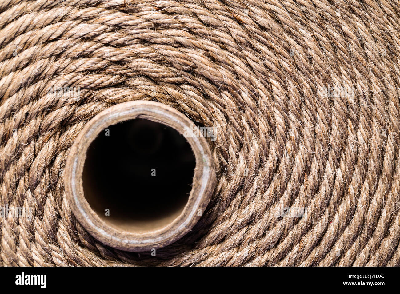rolled up brown rope background with core Stock Photo - Alamy